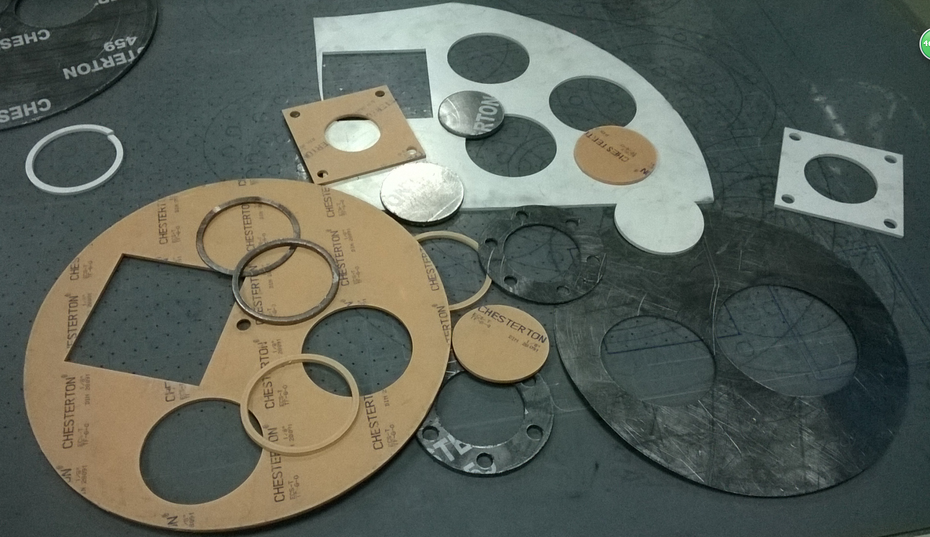 Graphite Gasket with inox perforated bonding layer cutting machine ...